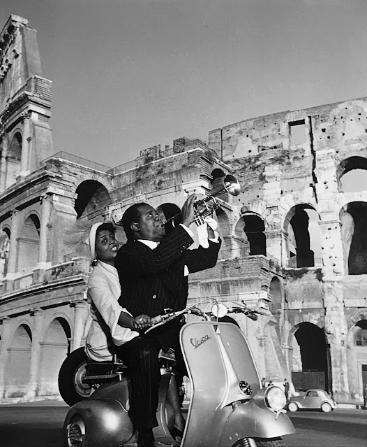 Louis Armstrong and Lucille Brown on a Vespa in Front of the Ancient ...